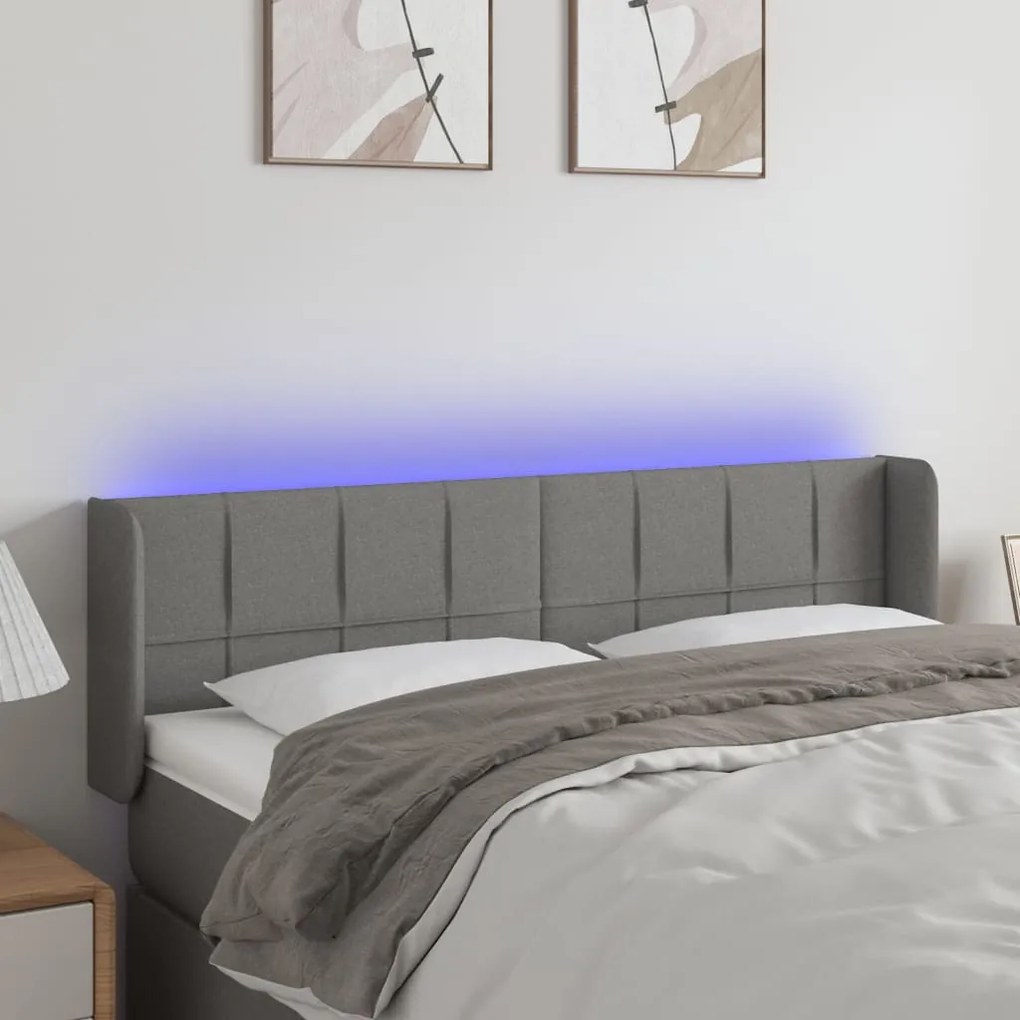 Čelo postele s LED tmavě šedé 147 x 16 x 78/88 cm textil 3123235