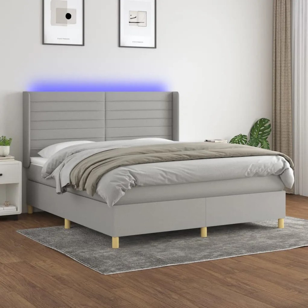Box spring postel s matrací a LED světle šedá 180x200 cm textil
