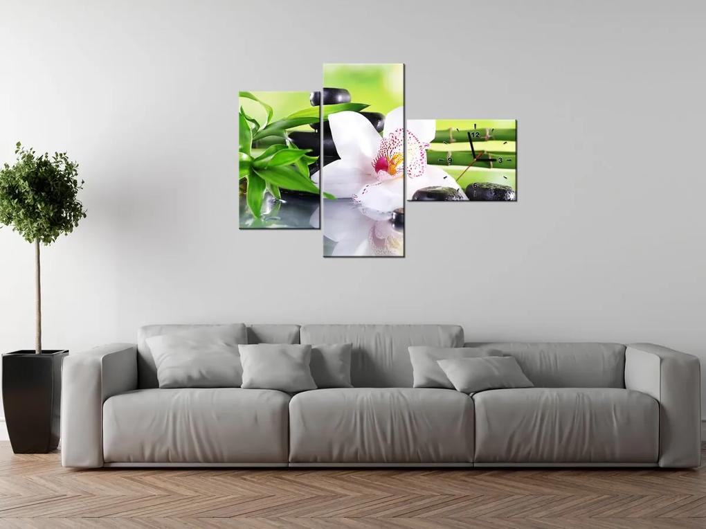 Gario Obraz s hodinami Bílá orchidej a kameny - 3 dílný Rozměry: 90 x 30 cm