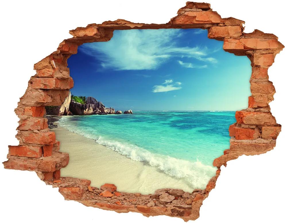 Wallmuralia Díra 3D ve zdi nálepka Seychely pláž 90x70 cm