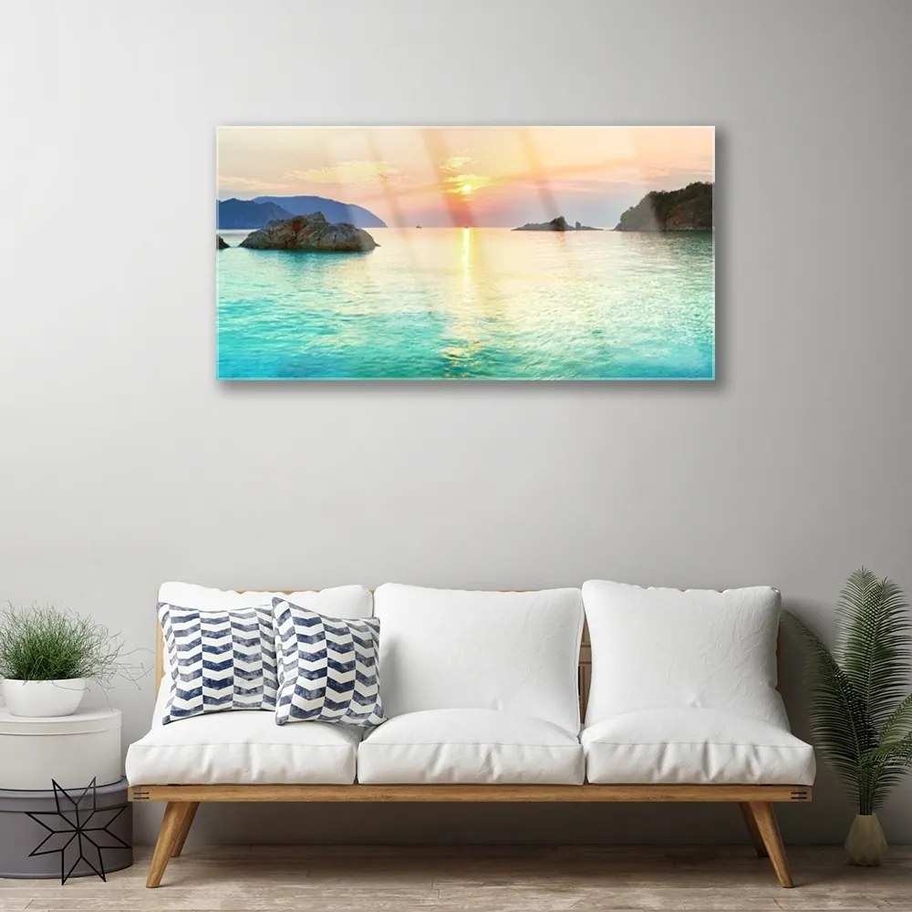Obraz na skle Slunce Skály Moře Krajina 100x50 cm