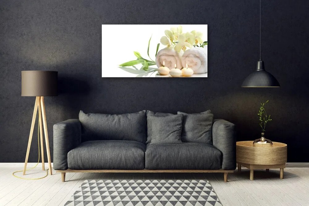 Obraz na skle Lázně Ručníky Svíce Orchidej 100x50 cm