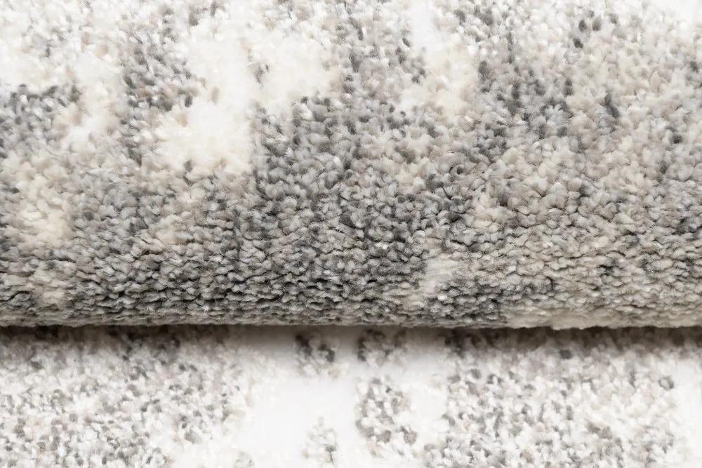 Designový koberec s abstraktním vzorem v krémové barvě Šířka: 140 cm | Délka: 200 cm