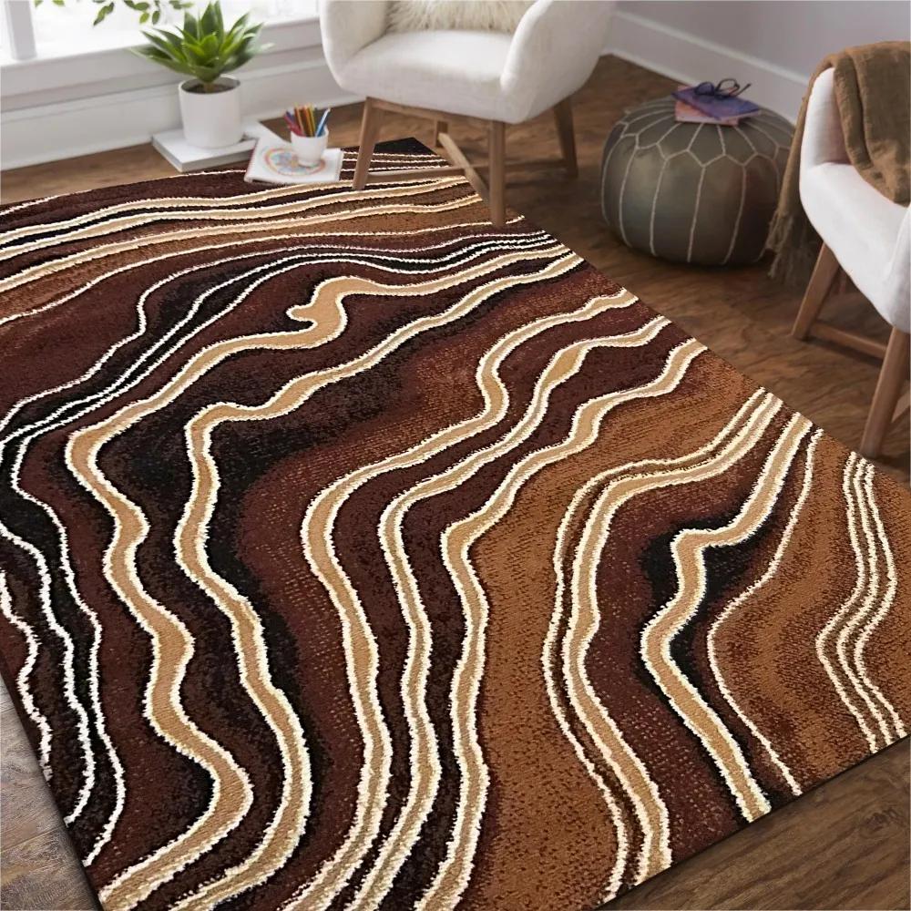 Originální hnědý vzorovaný koberec do obýváku Šířka: 150 cm | Délka: 210 cm