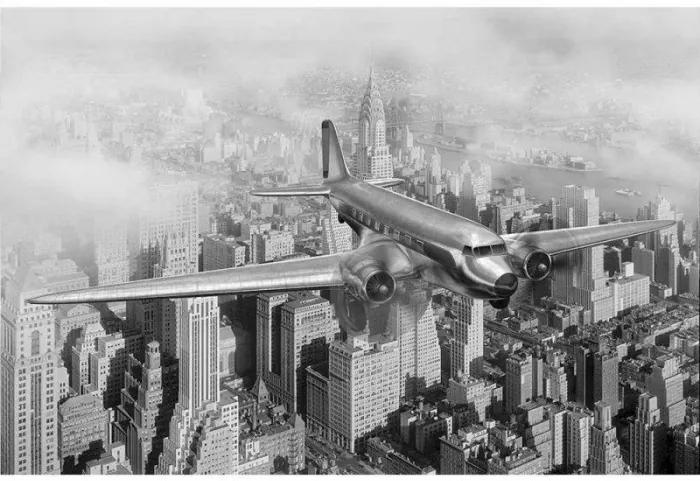 DIMEX | Vliesové fototapety na zeď Letadlo nad městem MS-5-0006 | 375 x 250 cm| černobílá