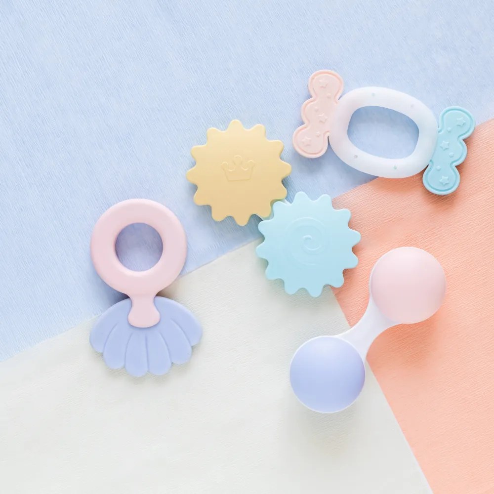 Canpol babies Sada chrastítek s kousátky Pastels 4ks