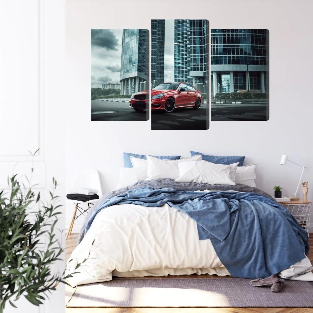 Vícedílný obraz Červené Auto Na Pozadí Moderních Mrakodrapů Nedostatek Nedostatek Přírodní plátno 180x120