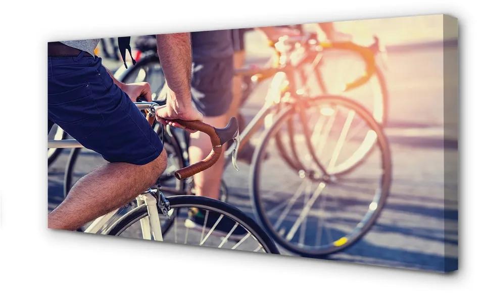Obrazy na plátně cyklisté lidí 120x60 cm