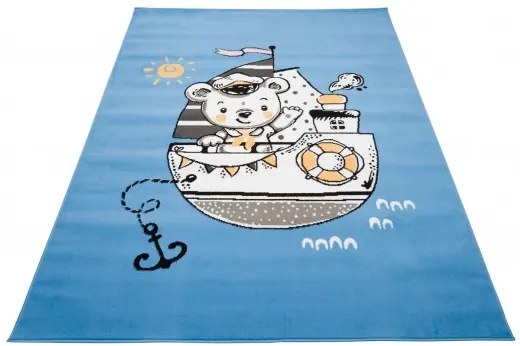 Dětský kusový koberec JOLLY DZ04C Námořník Medvídek Lodička Moře modrý Rozměr: 140x200 cm