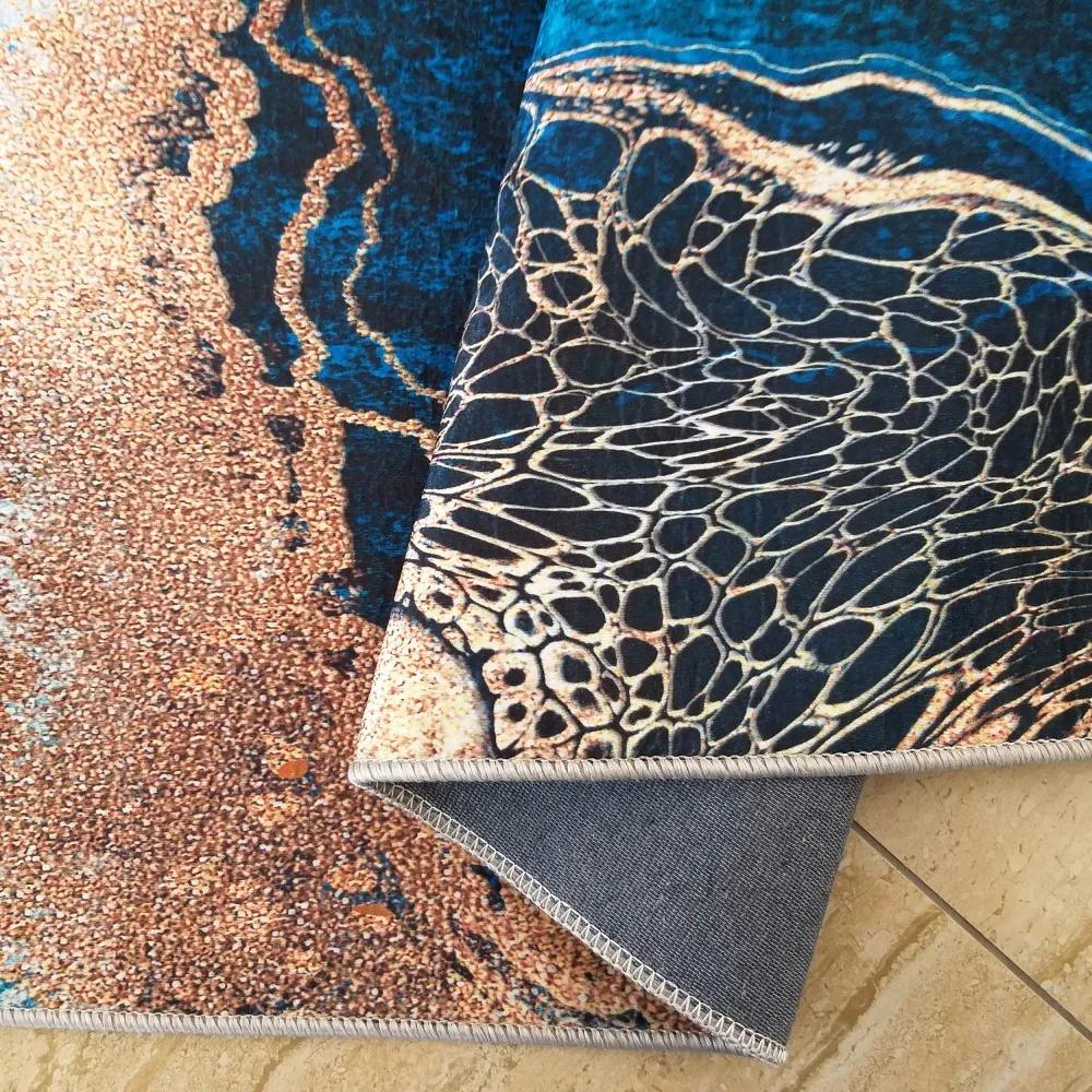 Protiskluzový koberec v modré barvě s abstraktním vzorem Šířka: 80 cm | Délka: 150 cm