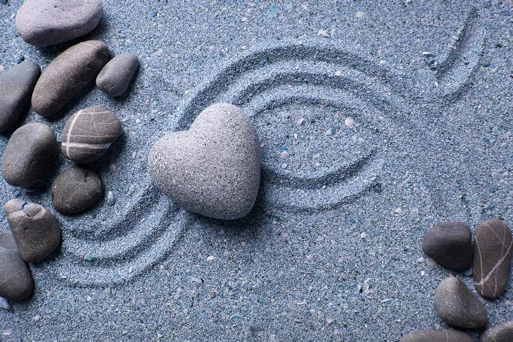 Samolepící fototapeta srdce z kamene na písku - 225x150 cm