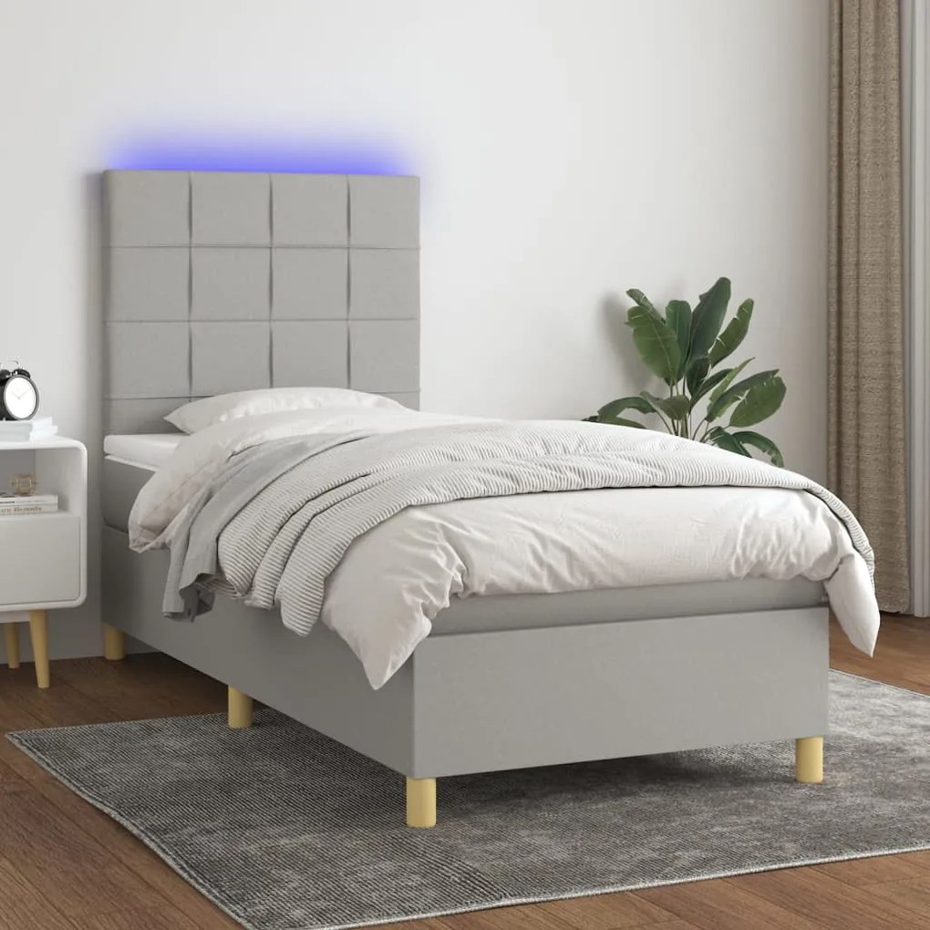 Box spring postel s matrací a LED světle šedá 90x200 cm textil