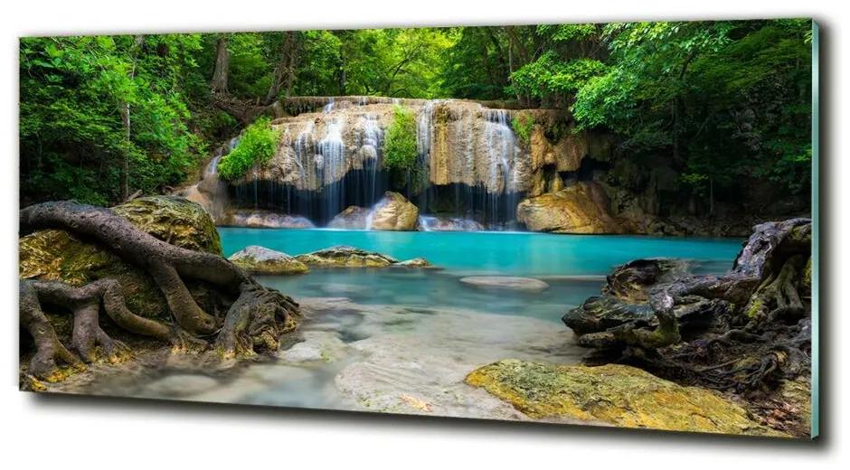 Wallmuralia Foto obraz skleněný horizontální Vodopád v lese 125x50 cm