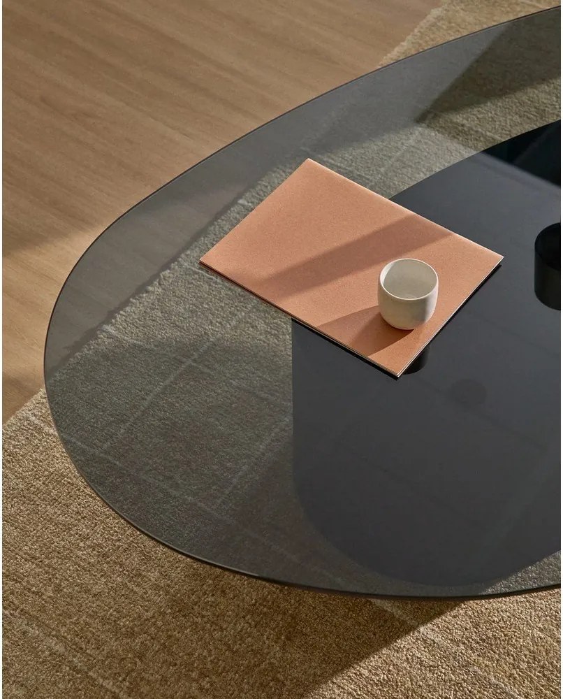 Černý konferenční stolek se skleněnou deskou 81x140 cm Olir – Kave Home