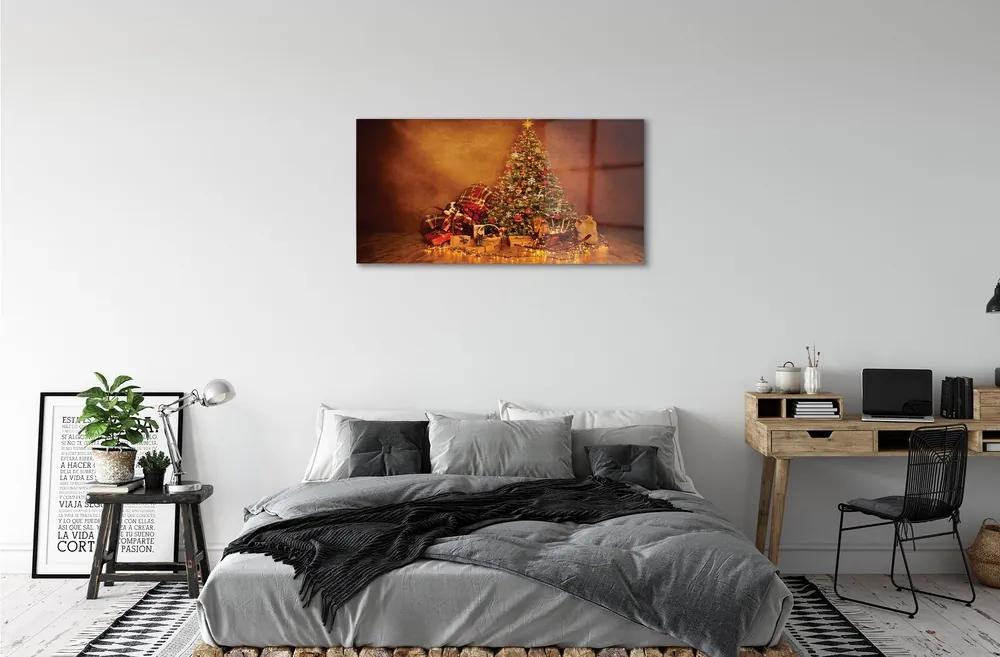 Obraz na skle Vánoční osvětlení dekorace dárky 140x70 cm