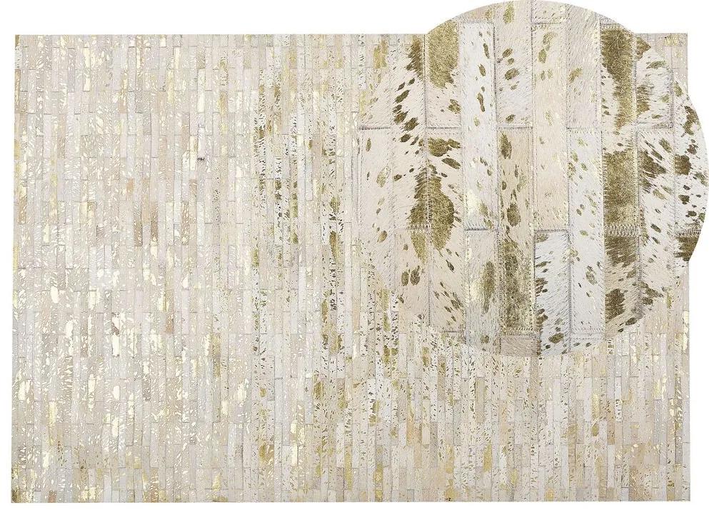 Kožený patchworkový koberec 140 x 200 cm zlato-béžový TOKUL Beliani