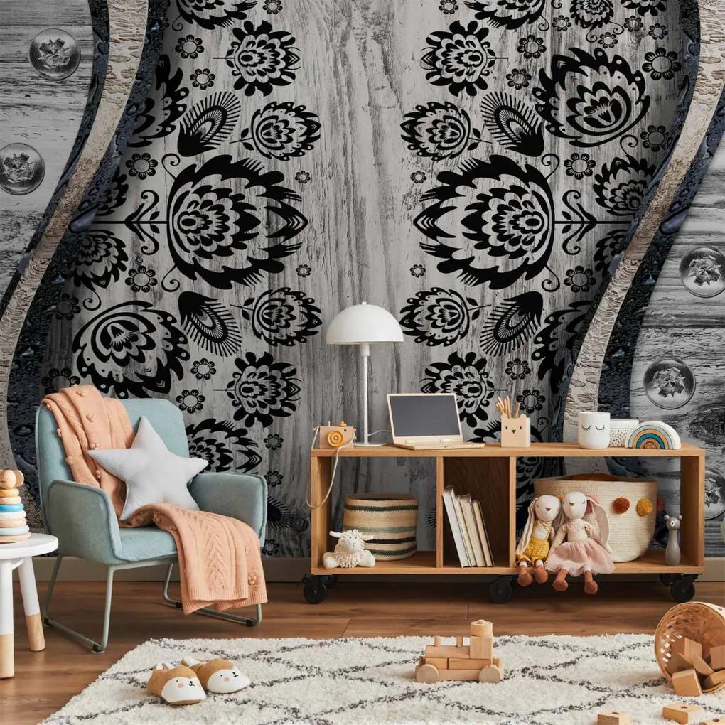 Fototapeta Inspirace - černé ornamenty na pozadí z hrubého dřeva v odstínech šedi