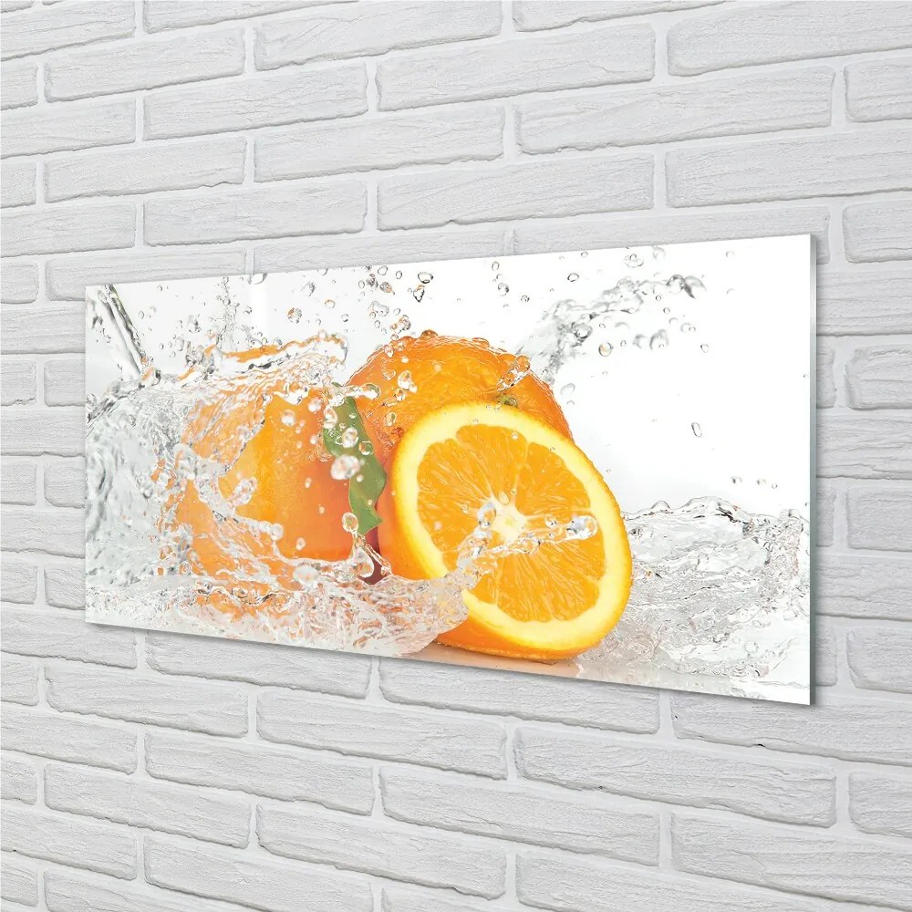 Obraz na skle Pomeranče ve vodě 100x50 cm