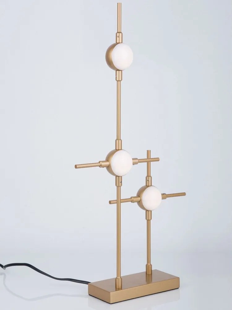 Kovová LED stolní lampa ve zlaté barvě se stínidlem z akrylového skla (výška 52 cm) Atomo – Nova Luce