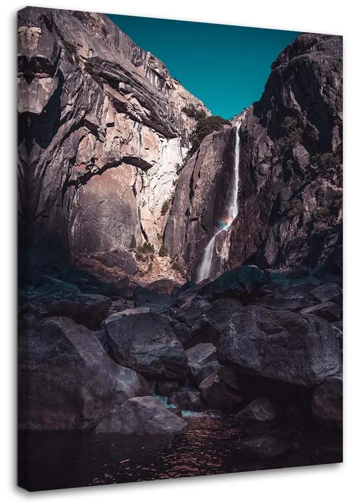 Gario Obraz na plátně Vodopád mezi vysokými skalami Rozměry: 40 x 60 cm