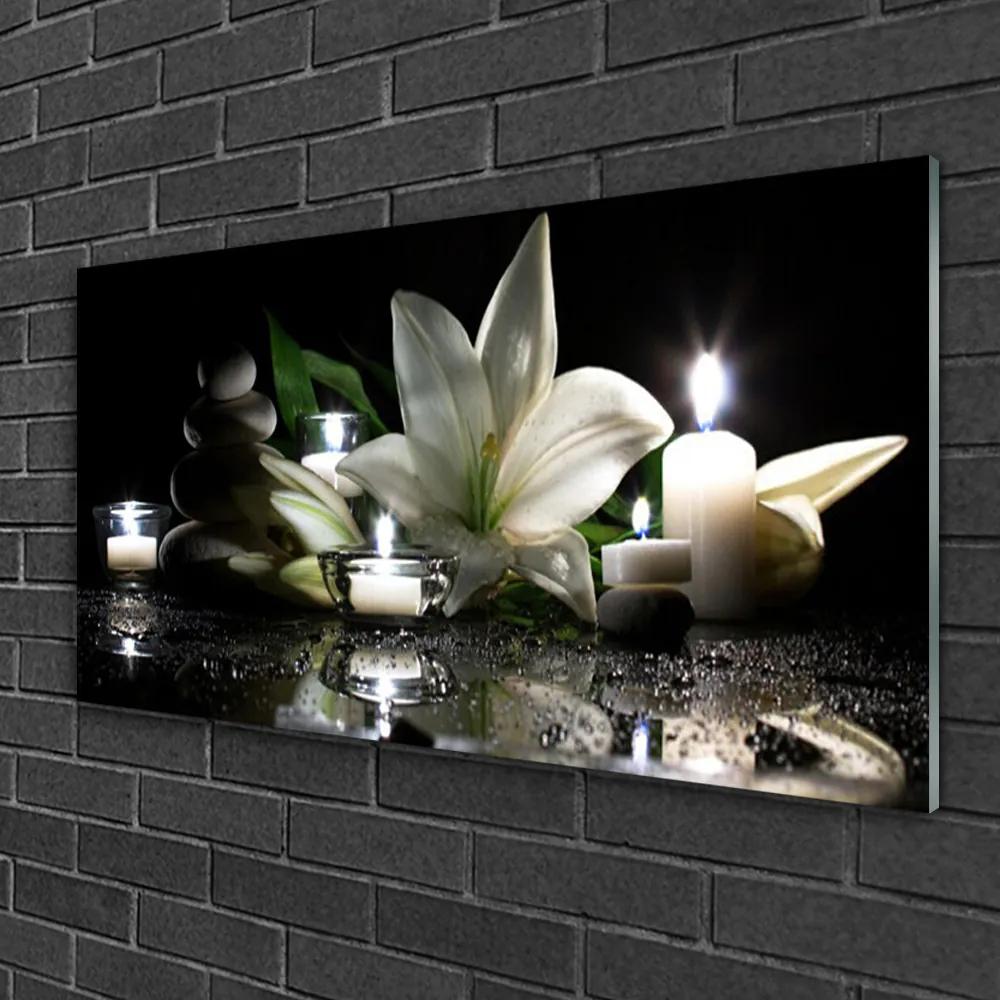 Obraz na skle Lilie Svíce Kameny Lázně 100x50 cm