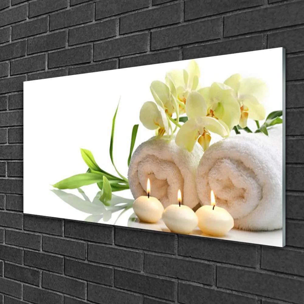 Obraz na skle Lázně Ručníky Svíce Orchidej 140x70 cm