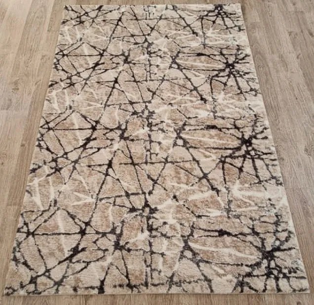 HU Béžový koberec Plush Deluxe Béžovo-mramorový Rozměr: 50x80 cm
