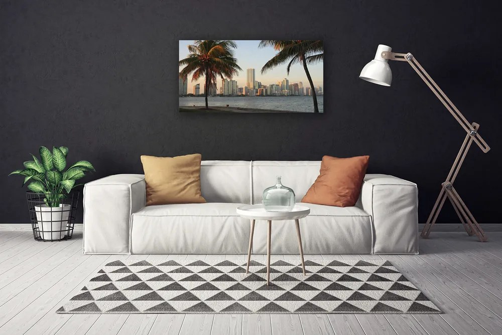 Obraz na plátně Palmy Tropy Město Moře 100x50 cm
