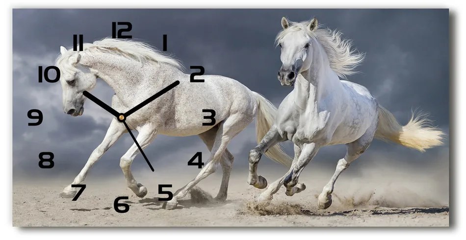Wallmuralia Skleněné hodiny na stěnu Bílí koně pláž 60x30 cm