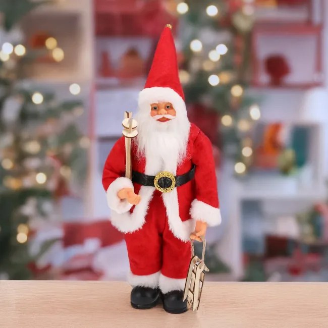 Vánoční dekorace Santa Claus se sáňkami a lyžemi červená 30 cm