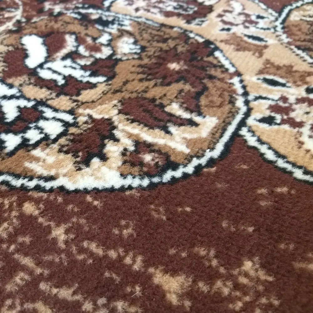 Originální vintage koberec v hnědé barvě Šířka: 40 cm | Délka: 60 cm
