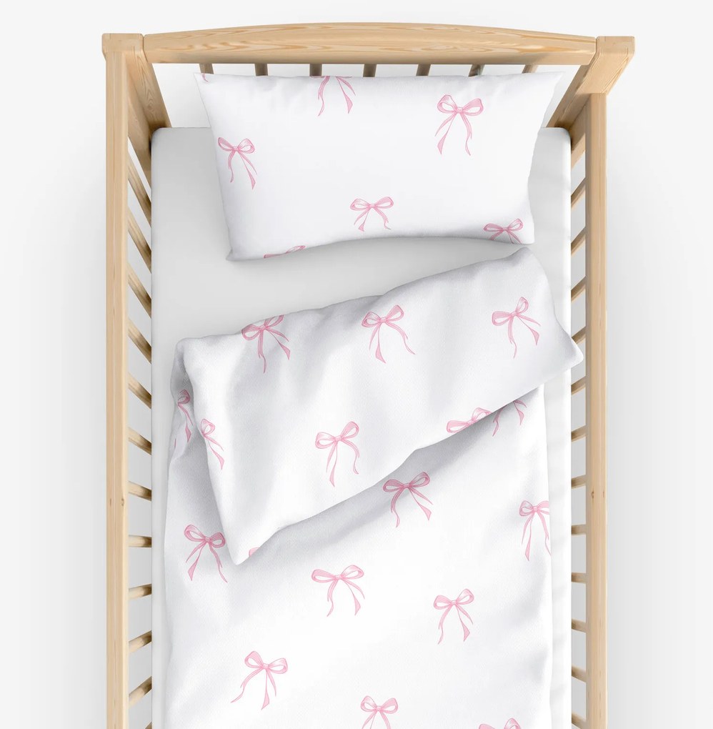 Goldea dětské bavlněné povlečení do postýlky - růžové mašličky 90 x 120 a 40 x 60 cm