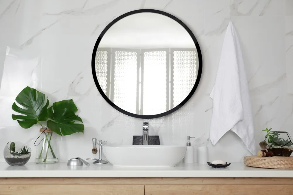 Kulaté zrcadlo do obývacího pokoje černý rám fi 40 cm
