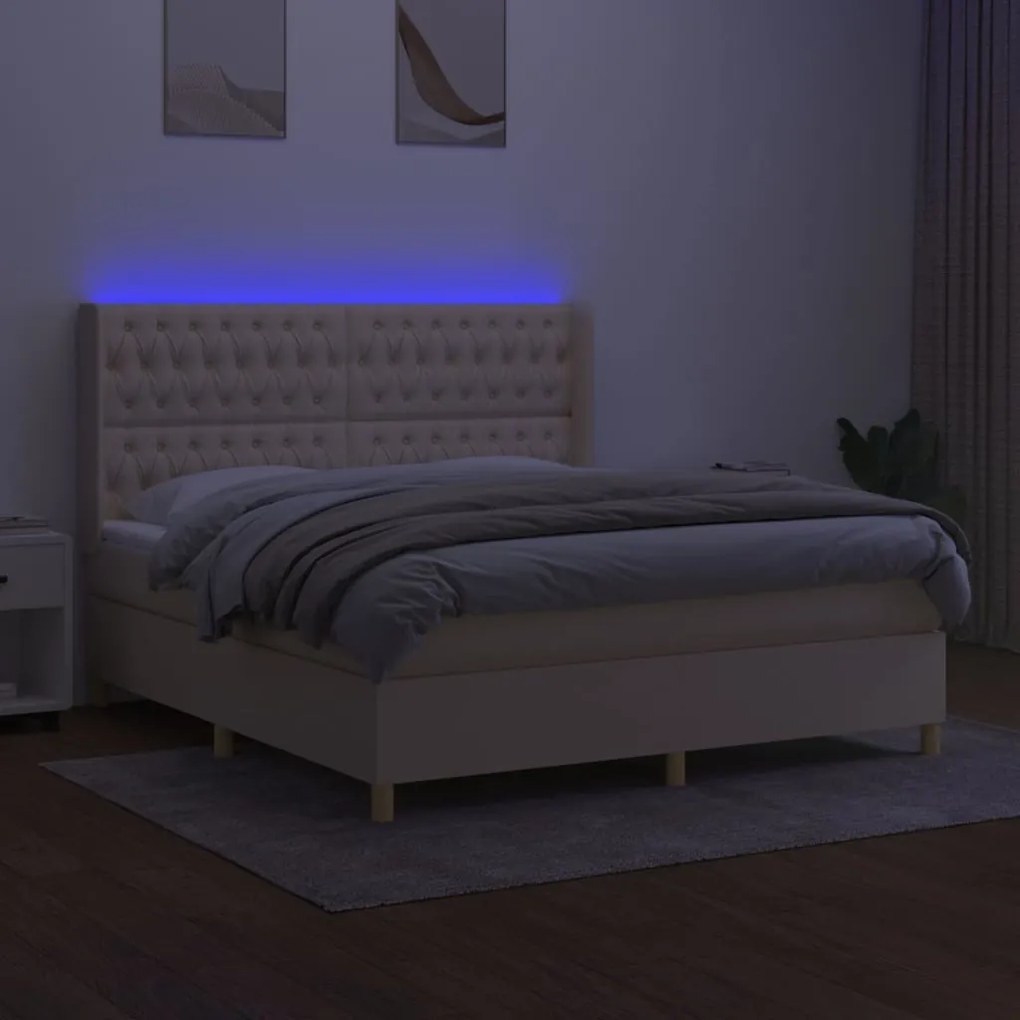 Box spring postel s matrací a LED krémová 180x200 cm textil 3139138