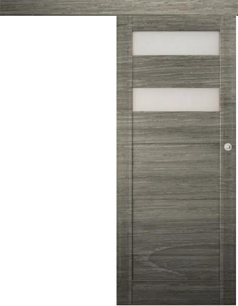 posuvné interiérové dveře na stěnu vasco doors SANTIAGO model 5 Průchozí rozměr: 70 x 197 cm, Orientace dveří: Levé dveře, Dekor: Dub riviera