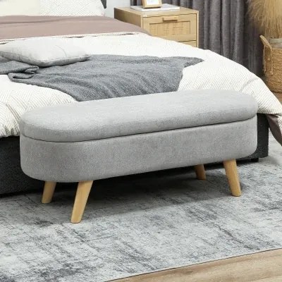 HOMCOM úložný puf s kožešinovým sametovým potahem, dřevěnými nohami a polstrovaným sedákem, světle šedý