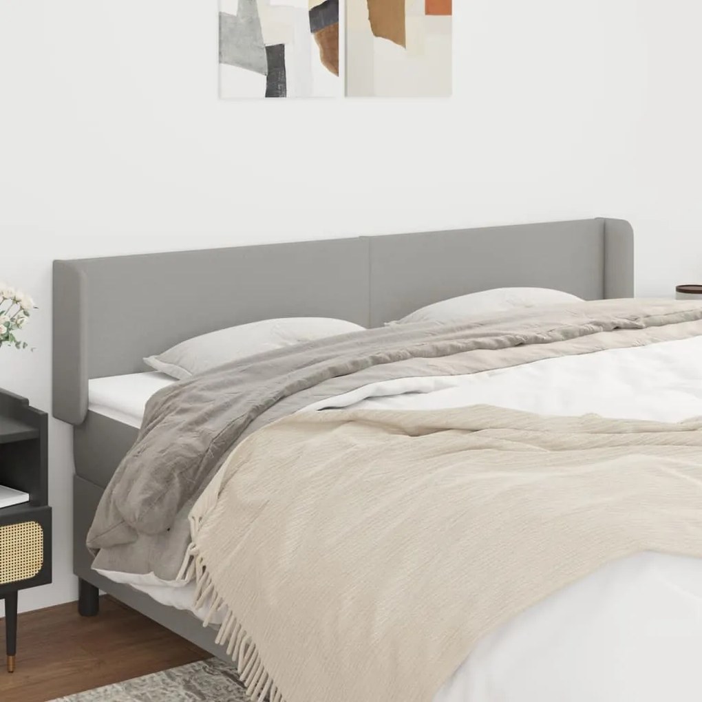 Čelo postele typu ušák světle šedé 163x16x78/88 cm textil 3118494