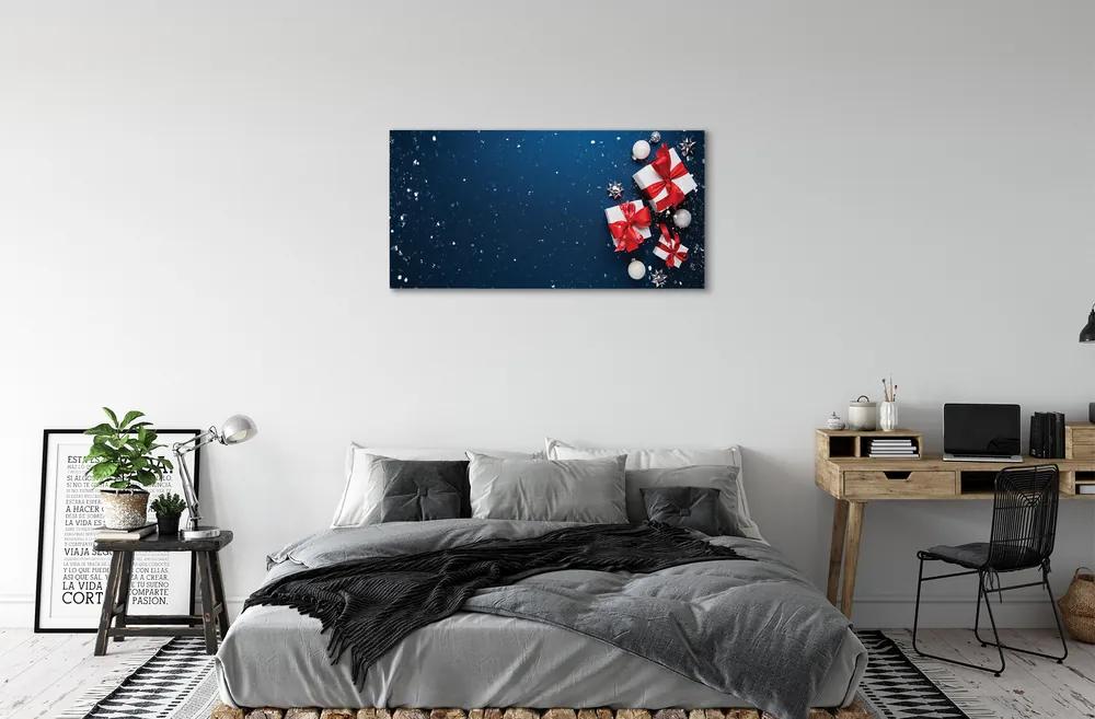 Obrazy na plátně Dárky cetky sníh 140x70 cm