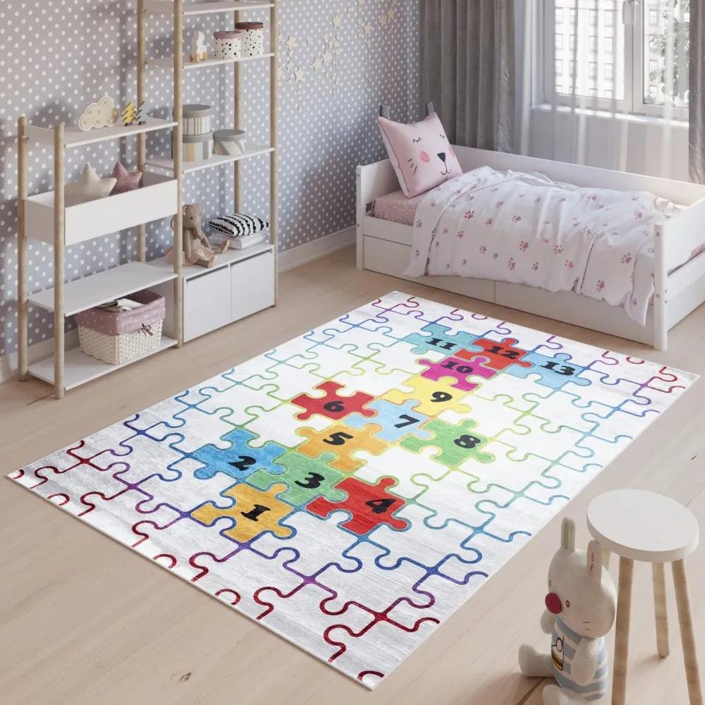 Dětský koberec s barevným motivem puzzle Šířka: 160 cm | Délka: 220 cm