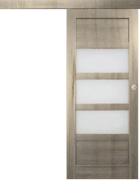 posuvné interiérové dveře na stěnu vasco doors BRAGA model B Průchozí rozměr: 70 x 197 cm, Orientace dveří: Levé dveře, Dekor: Dub Aljaška