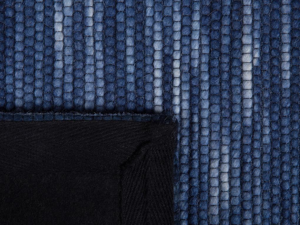 Modrý krátkovlasý koberec 160x230 cm KAPAKLI Beliani