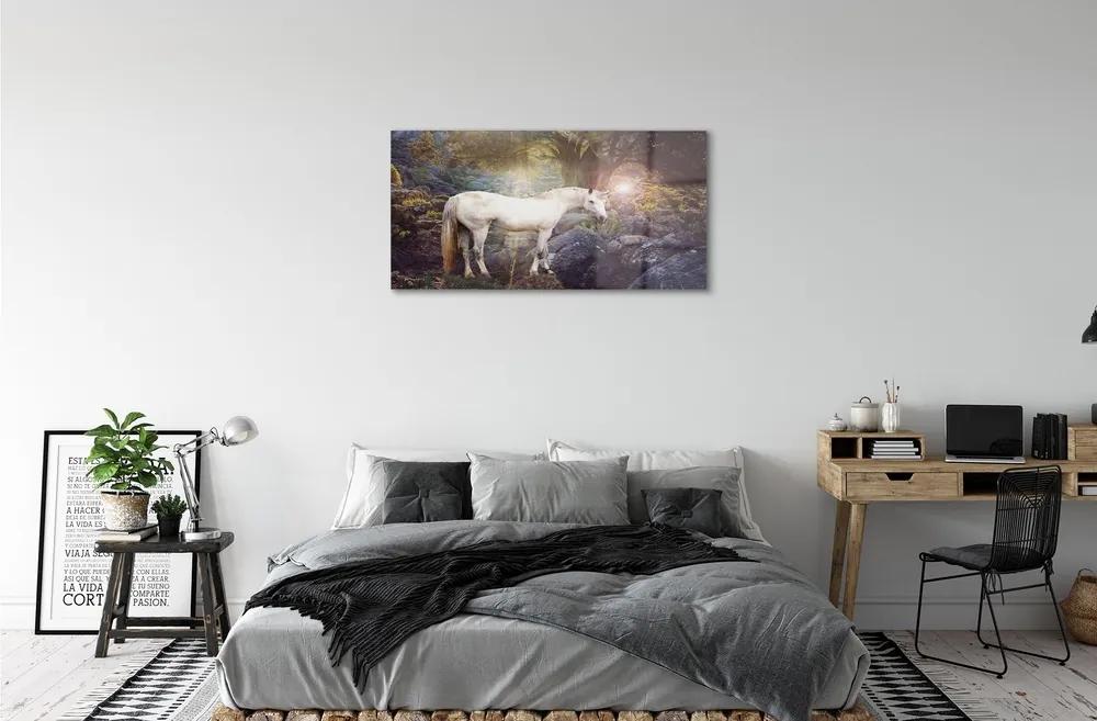 Obraz na skle Unicorn v lese 140x70 cm