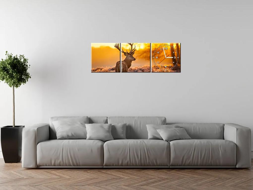 Gario Obraz s hodinami Silný jelen - 3 dílný Rozměry: 30 x 90 cm