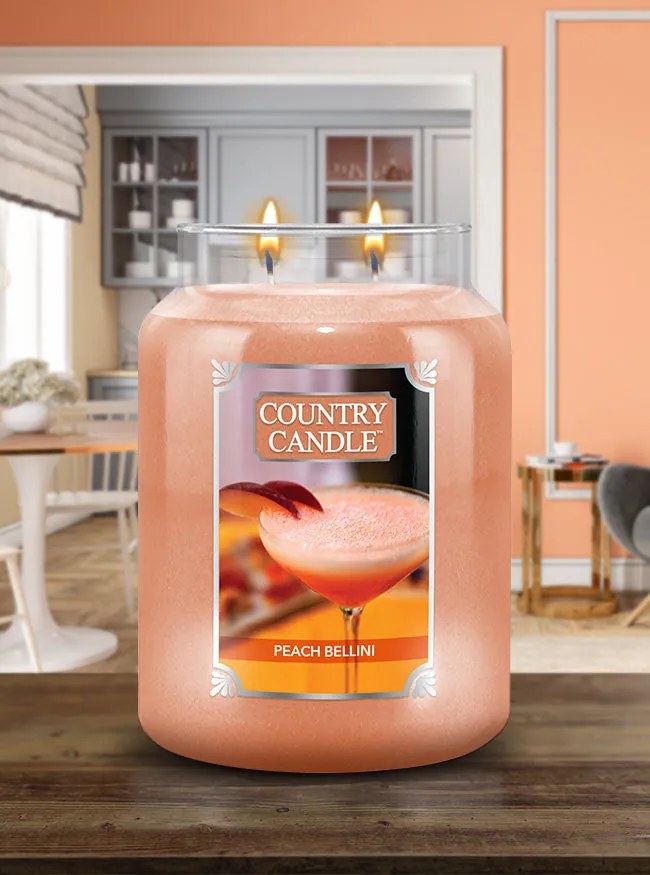 Country Candle – vonná svíčka Peach Bellini (Broskvový koktejl), 680 g