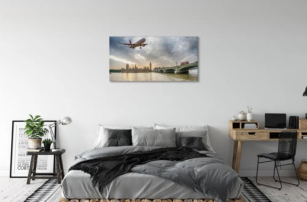 Obrazy na plátně letadel mraky 125x50 cm