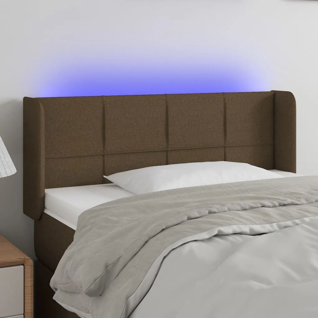 Čelo postele s LED tmavě hnědé 83 x 16 x 78/88 cm textil 3123213