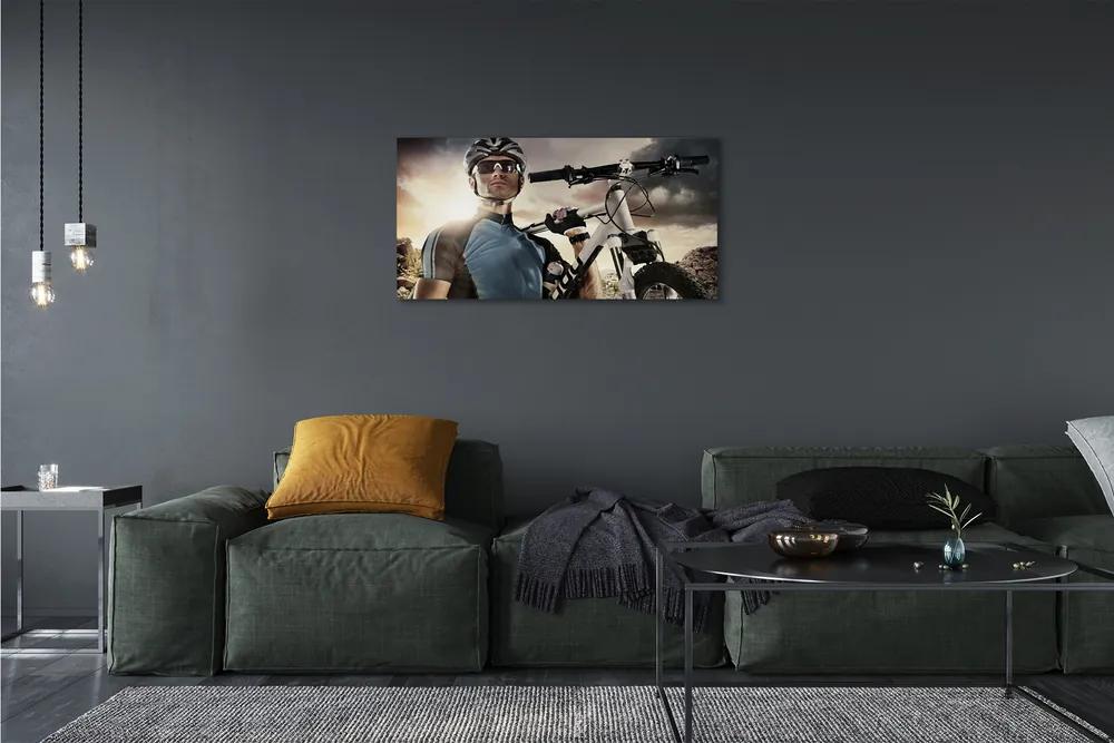 Obrazy na plátně Cyklista na kole mraky 120x60 cm