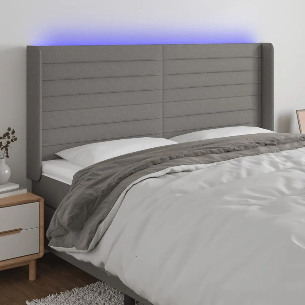Čelo postele s LED tmavě šedé 183 x 16 x 118/128 cm textil 3124203
