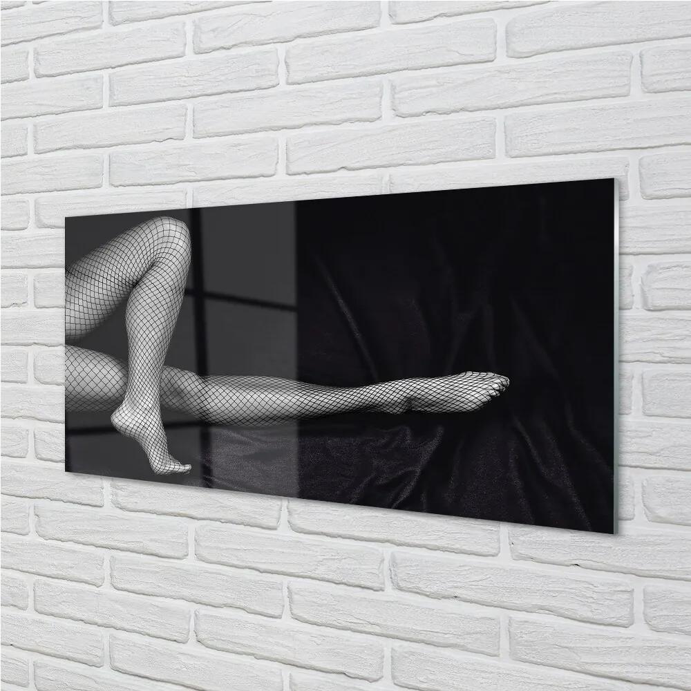Obraz na skle Černé a bílé síťované nohy 140x70 cm