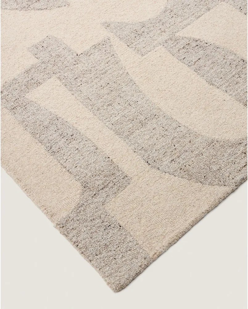 Šedý/béžový ručně tkaný vlněný koberec 200x300 cm Norela – Kave Home